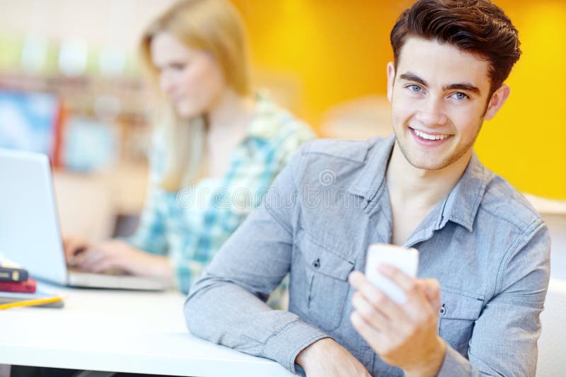 Education, Phone and Portrait of Student Man in Library at College or ...