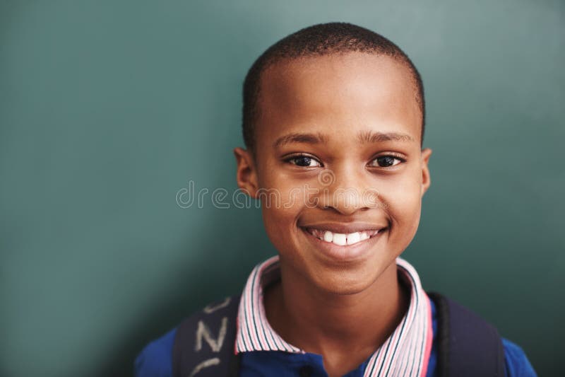 Education, Portrait and Smile of Boy on Chalkboard in School Classroom ...