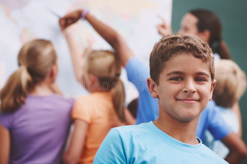 Education, Portrait and Smile of Boy in Classroom of School for Child ...