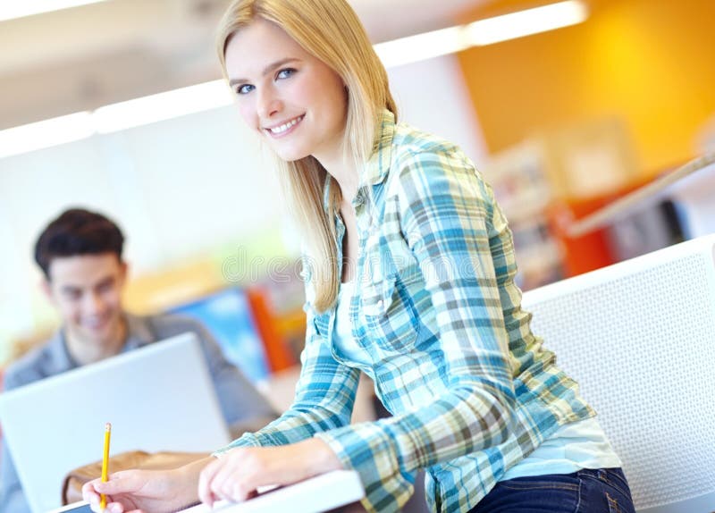 Education, Portrait and Smile of Student Woman in Library at College or ...