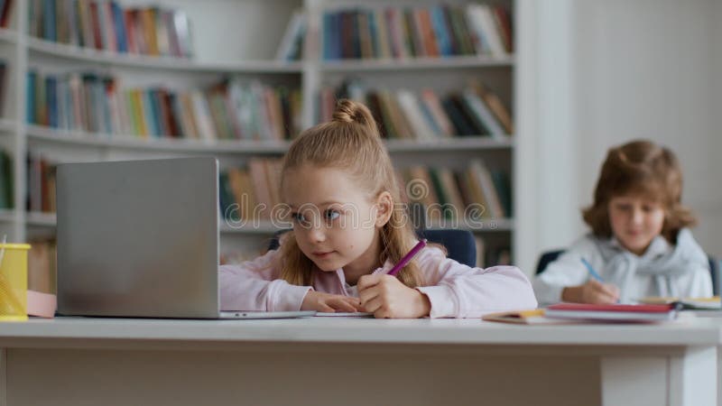 Education Process. Primary Students Studying in Modern Classroom with ...