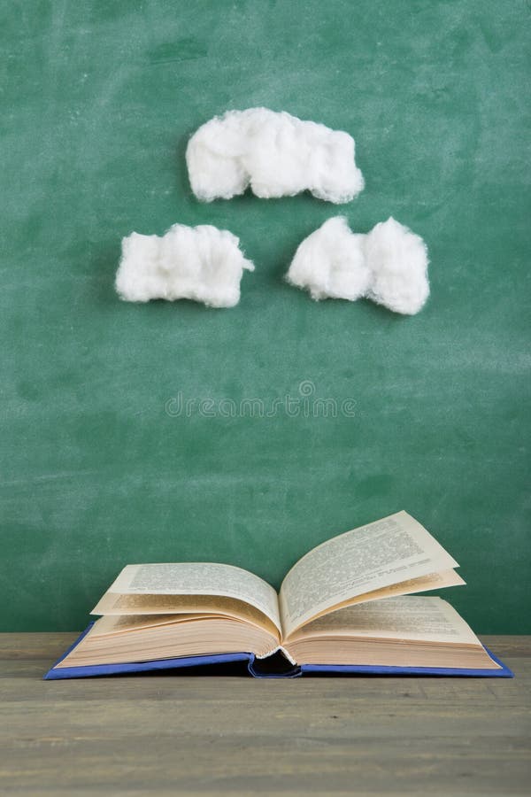 Education and Reading Creative Concept - Open Under the Cotton Clouds ...