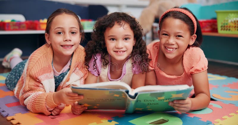 Education, Reading and Face of Children with Book in Classroom for ...