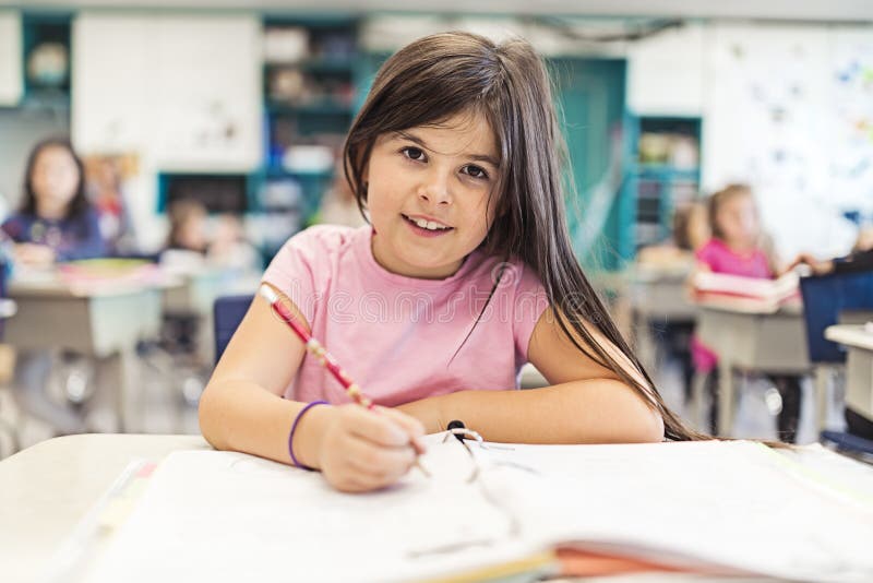 Education and School Concept Little Student Girl Studying at School ...
