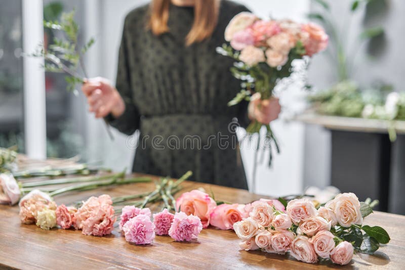 Woman Florist Creating Beautiful Bouquet in Flower Shop. Work in Flower ...