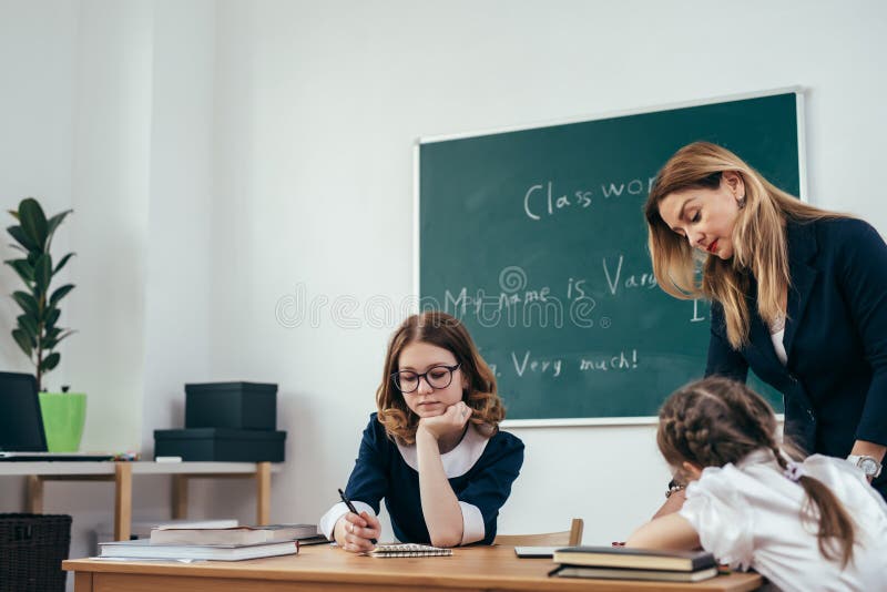Education School Lesson Female Teacher with Pupils Stock Image - Image ...
