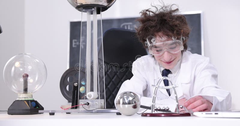 Education, Science and Kids Concept - Boy Wearing Goggles for Physics ...