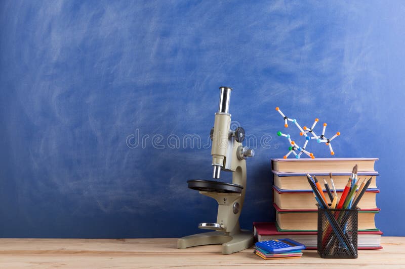 Microscope and Molecule Model on a Desk with Fruits and Vegetables ...