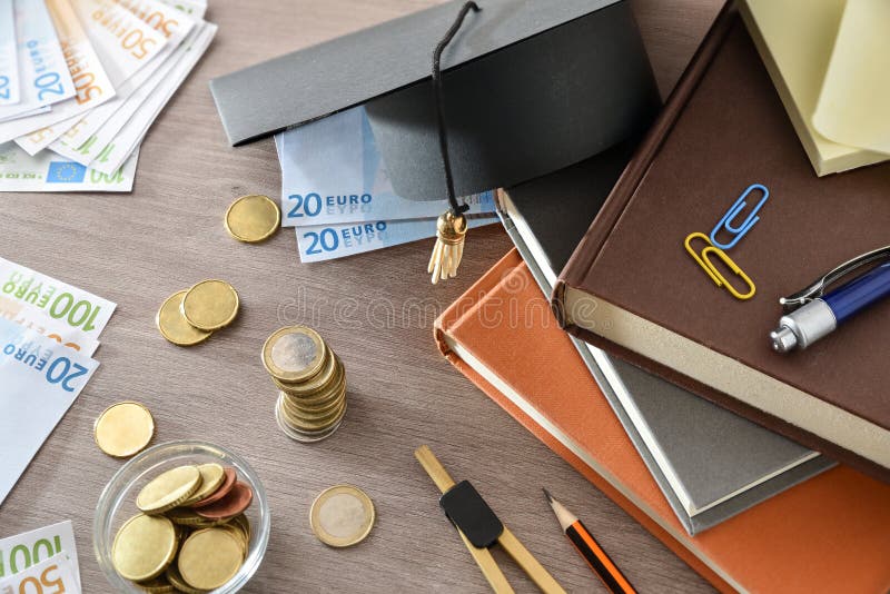 Education Spending Concept with Books and Money Top View Stock Image ...
