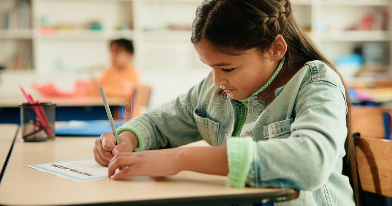 Education, Students and Girl Writing in Classroom for Learning, Math or Problem Solving ...