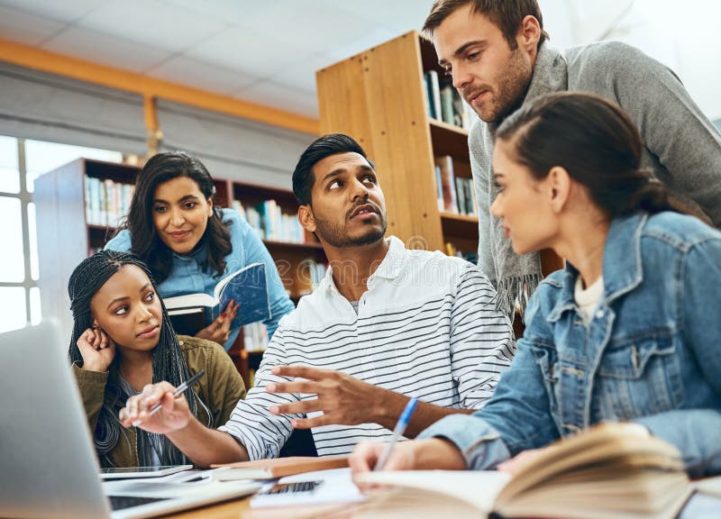 Education, Talking and Students Studying in a Library for a Group ...