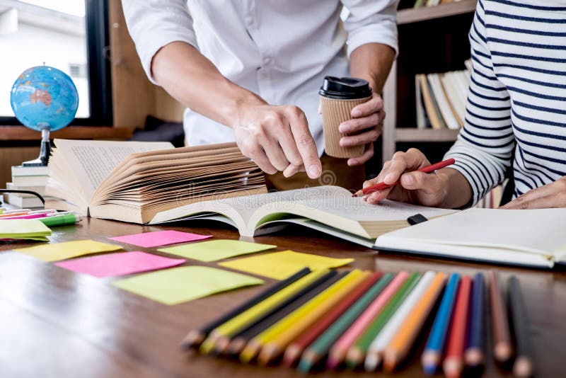 Education, Teaching, Learning Concept. Two High School Students or ...