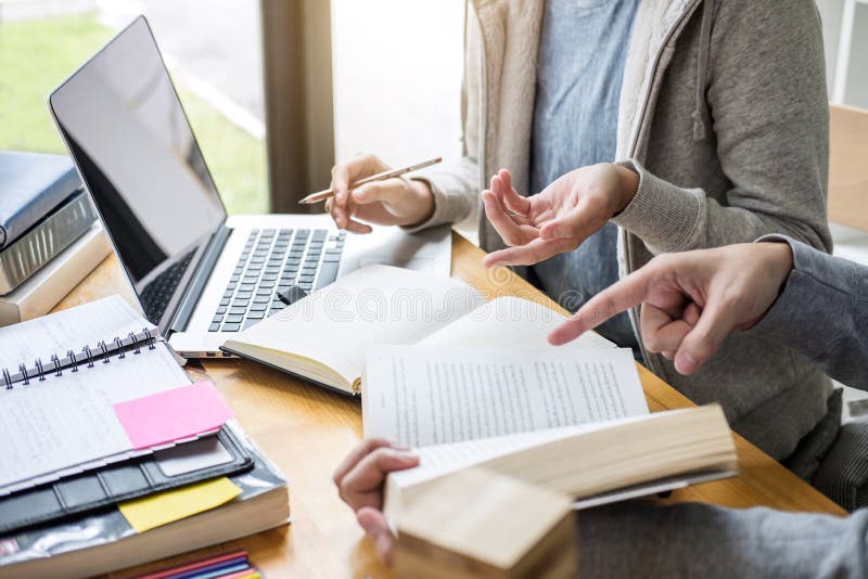 Education, Teaching, Learning, Technology and People Concept. Two High ...