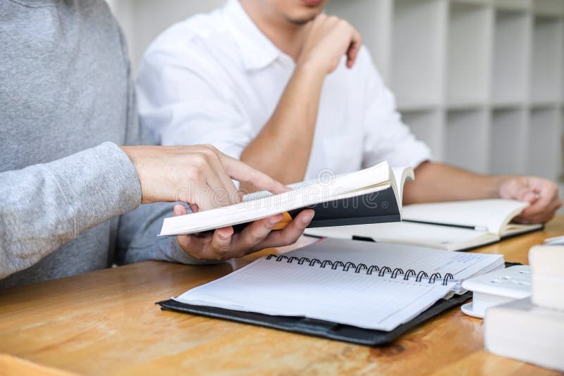 Education, Teaching, Learning, Technology and People Concept. Two High ...