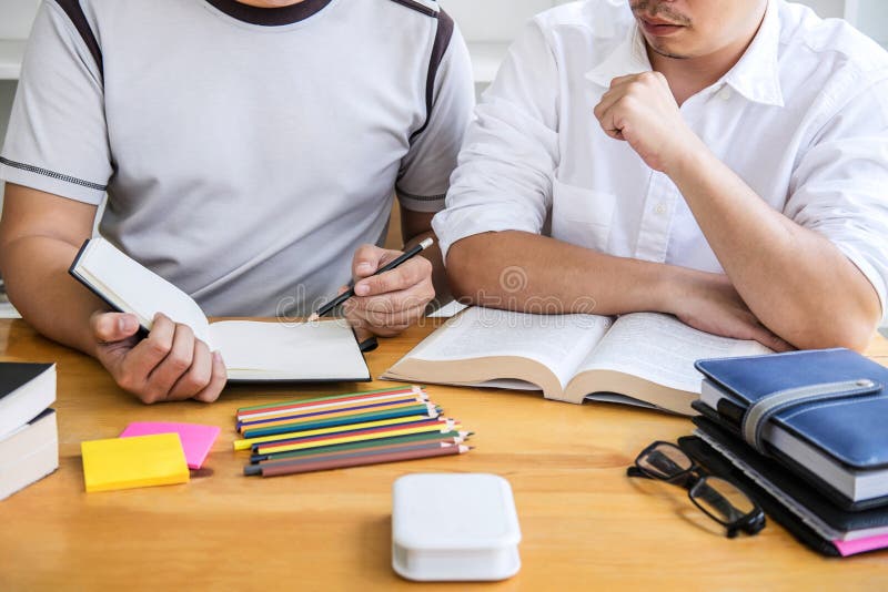 Education, Teaching, Learning, Technology and People Concept. Two High ...