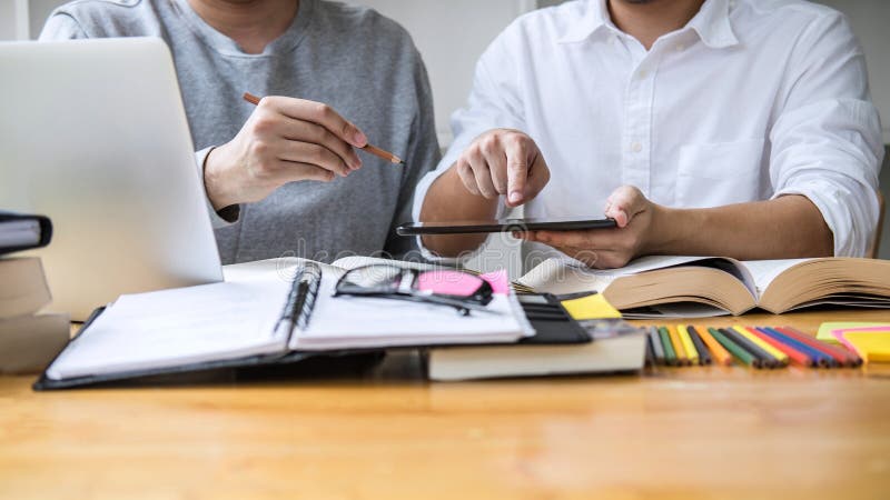 Education, Teaching, Learning, Technology and People Concept. Two High ...