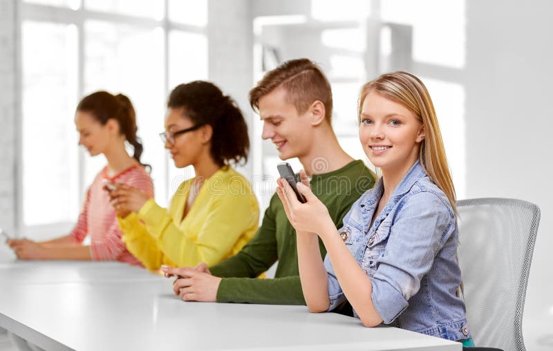 Group of School Kids Raising Hands in Classroom Stock Image - Image of ...