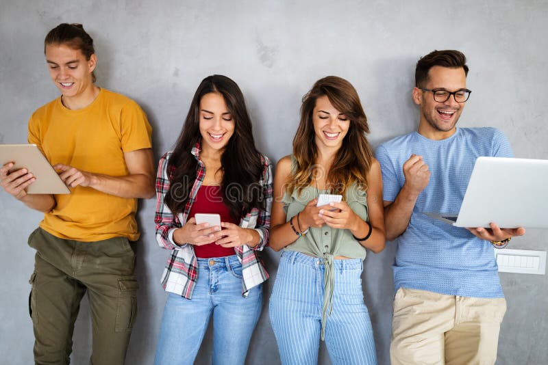 Education, Technology and People Concept. Happy Group of Friends Using ...