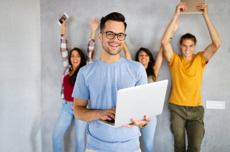 Education, Technology and People Concept. Happy Group of Friends Using ...