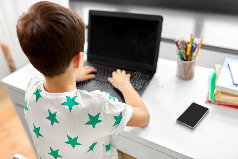 Student Boy Typing on Laptop Computer at Home Stock Image - Image of ...