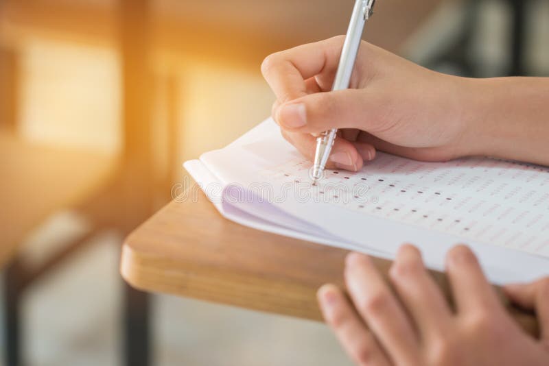 Education Test Concept : Hands Asian Students Thai Uniform Holding Pen ...