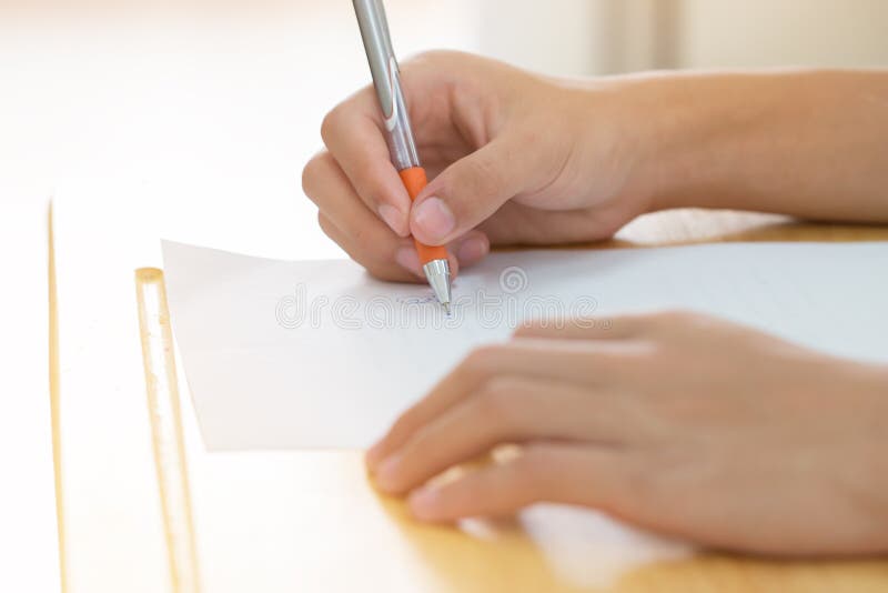 Education Test Concept : Hands Asian Students Thai Uniform Holding Pen ...