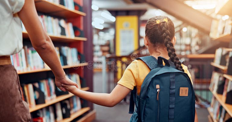 Education, Tutor and Child in Library, Holding Hands and Walking with ...