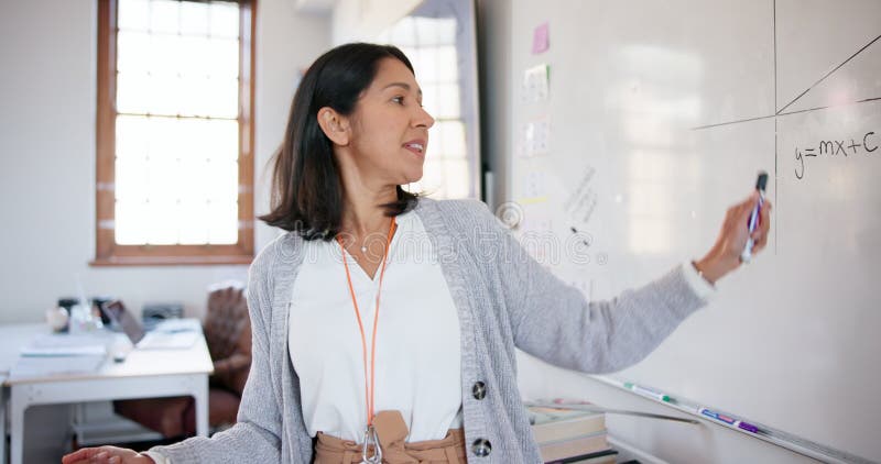 Education, Whiteboard and Teacher Doing Presentation in Classroom for ...