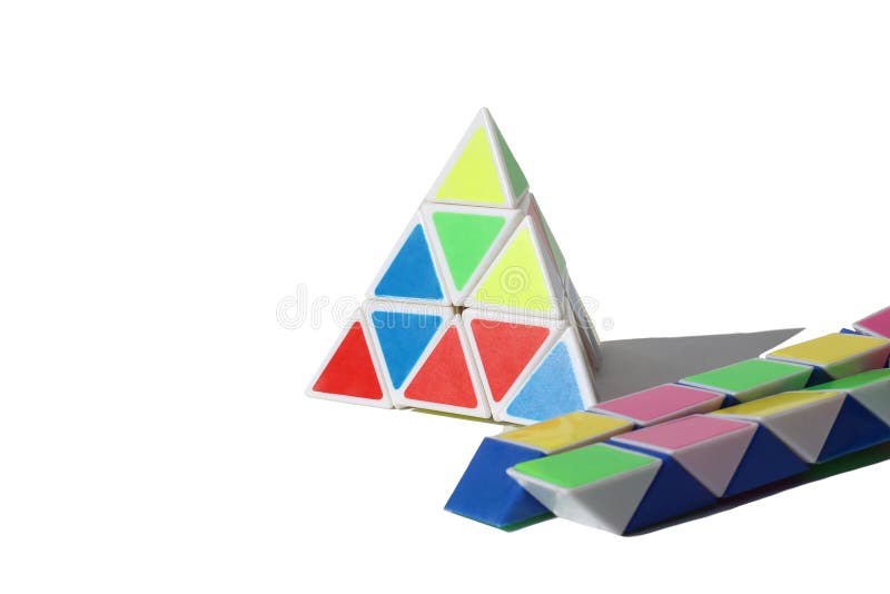 Educational Children`s Toy Puzzle in the Form of a Pyramid on a White ...