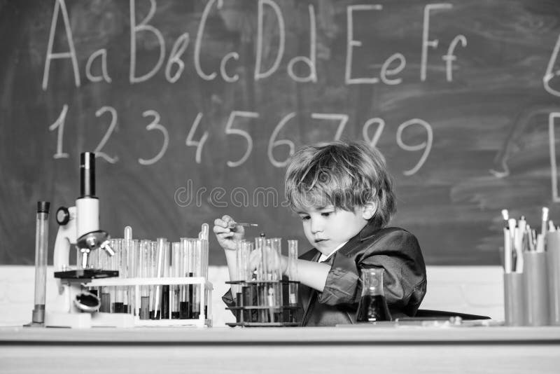 Educational Experiment. Boy Microscope and Test Tubes School Classroom ...