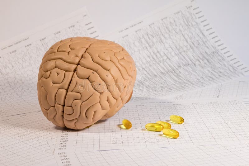 Educational Model of the Human Brain with Pills, in the Background ...