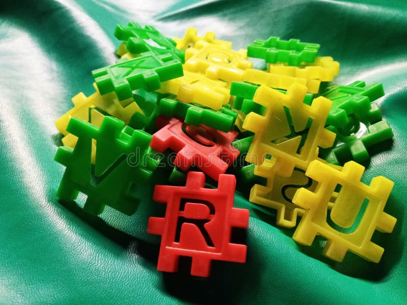 Educational Plastic Puzzle Toy Called Building Blocks on Colorful ...