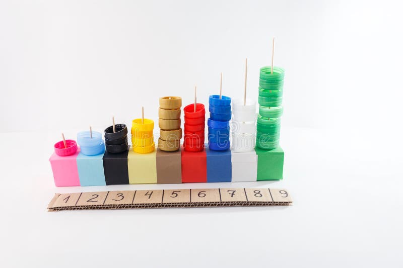 Educational Toy Made from Bottle Caps, Cardboard, and Sticks for ...
