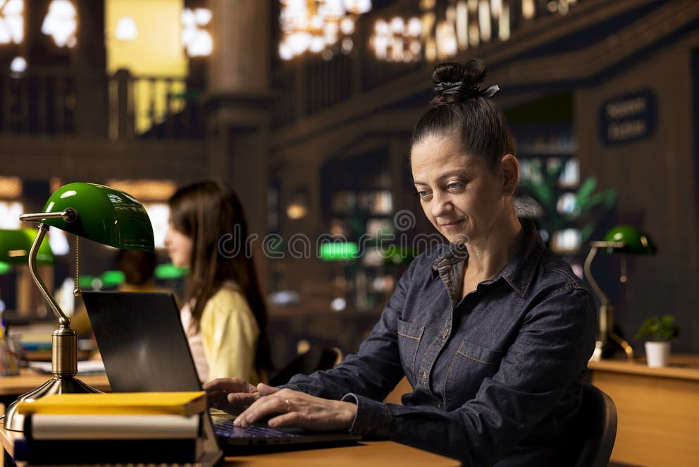 Educator Preparing Documents and Learning Materials for Her Teaching ...