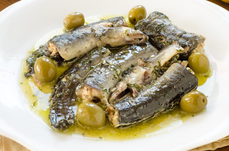 Eels with olive sauce stock image. Image of plate, seafood - 37967965