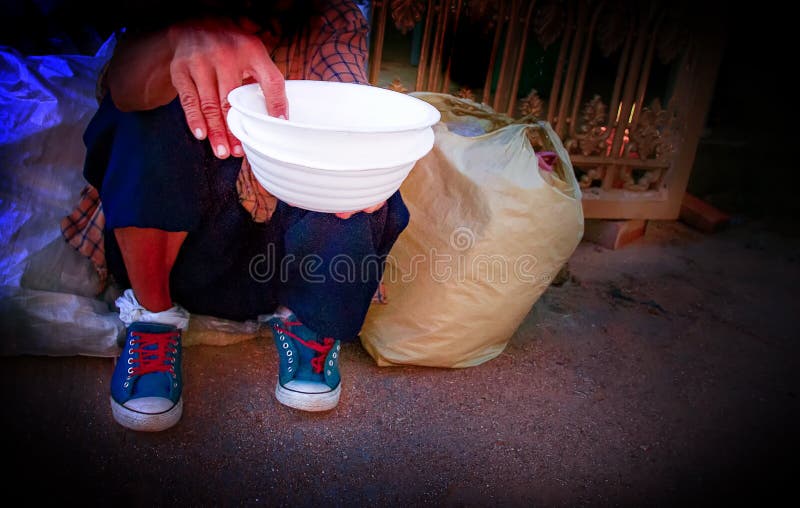 Een bedelaar met een kom stock foto. Image of voedsel - 87306470