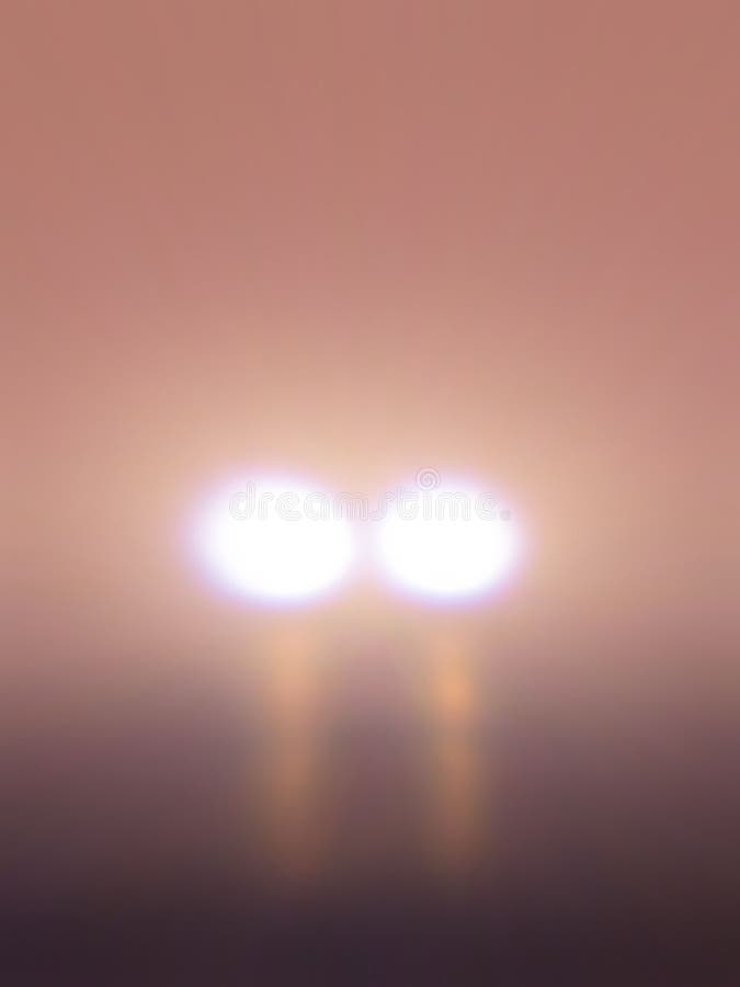 Eerie Lights in the Fog stock image. Image of reflect - 10913093