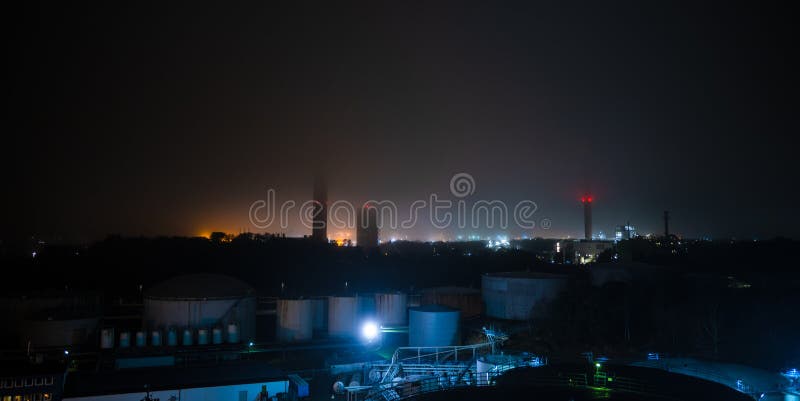 Eerie Mist Over a Oil Refinery at Night.. Stock Photo - Image of magic ...