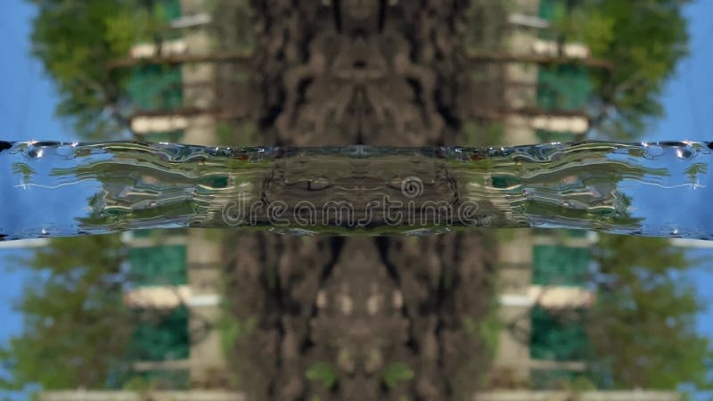 Effect of Mirror; Water Pouring on Blurred Textured Background Stock ...