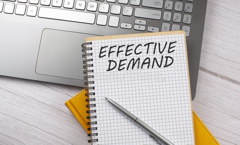 EFFECTIVE DEMAND Text Written on a Notebook on the Laptop Stock Photo ...