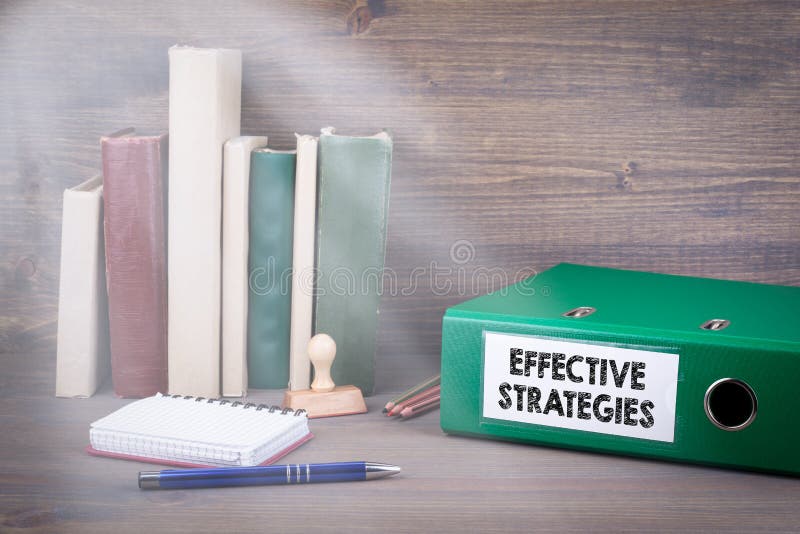 Effective Strategies. Binder on Desk in the Office. Business ...