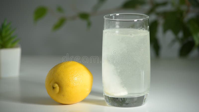 Effervescent Tablet Dissolves in a Glass of Clean Water Stock Video ...