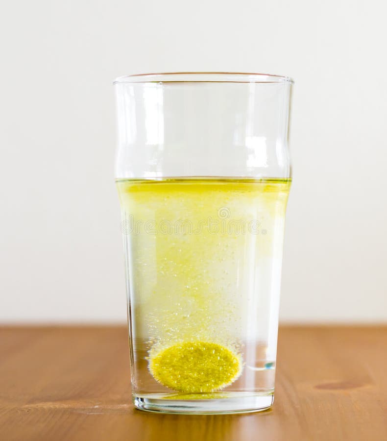 Effervescent Tablet and Glass of Water. Vitamin Beverage. Stock Image ...