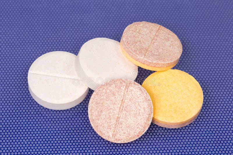 Different Effervescent Tablets on Yellow Surface, Close-up Stock Photo ...