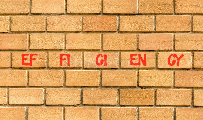 Efficiency Symbol. Concept Word Efficiency on Beautiful Brown Bricks ...