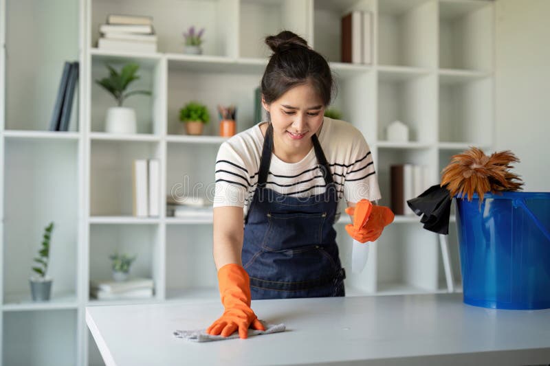Efficient Cleaning Service Worker Completing Task with Orange Gloves ...