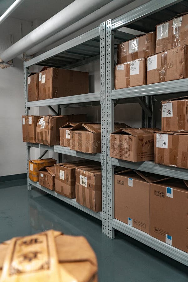 Efficient and Organized Storage Solutions Utilizing Cardboard Boxes on ... Efficient and Organized Storage Solutions Utilizing Cardboard Boxes on ...