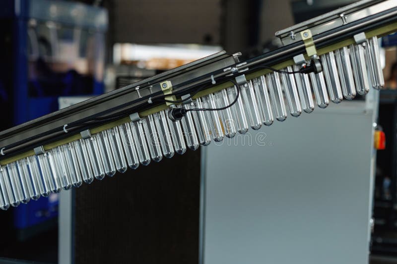 Efficient Plastic Bottle Production Line with Heating and Molding Stock ...