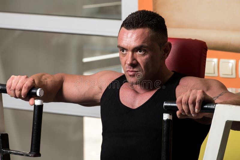 Effort on the Bench Press Exercise Machine Stock Image - Image of ...