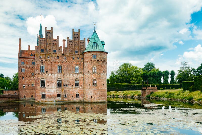 Egeskov Castle on Funen Island in Denmark Stock Image - Image of cloud ...